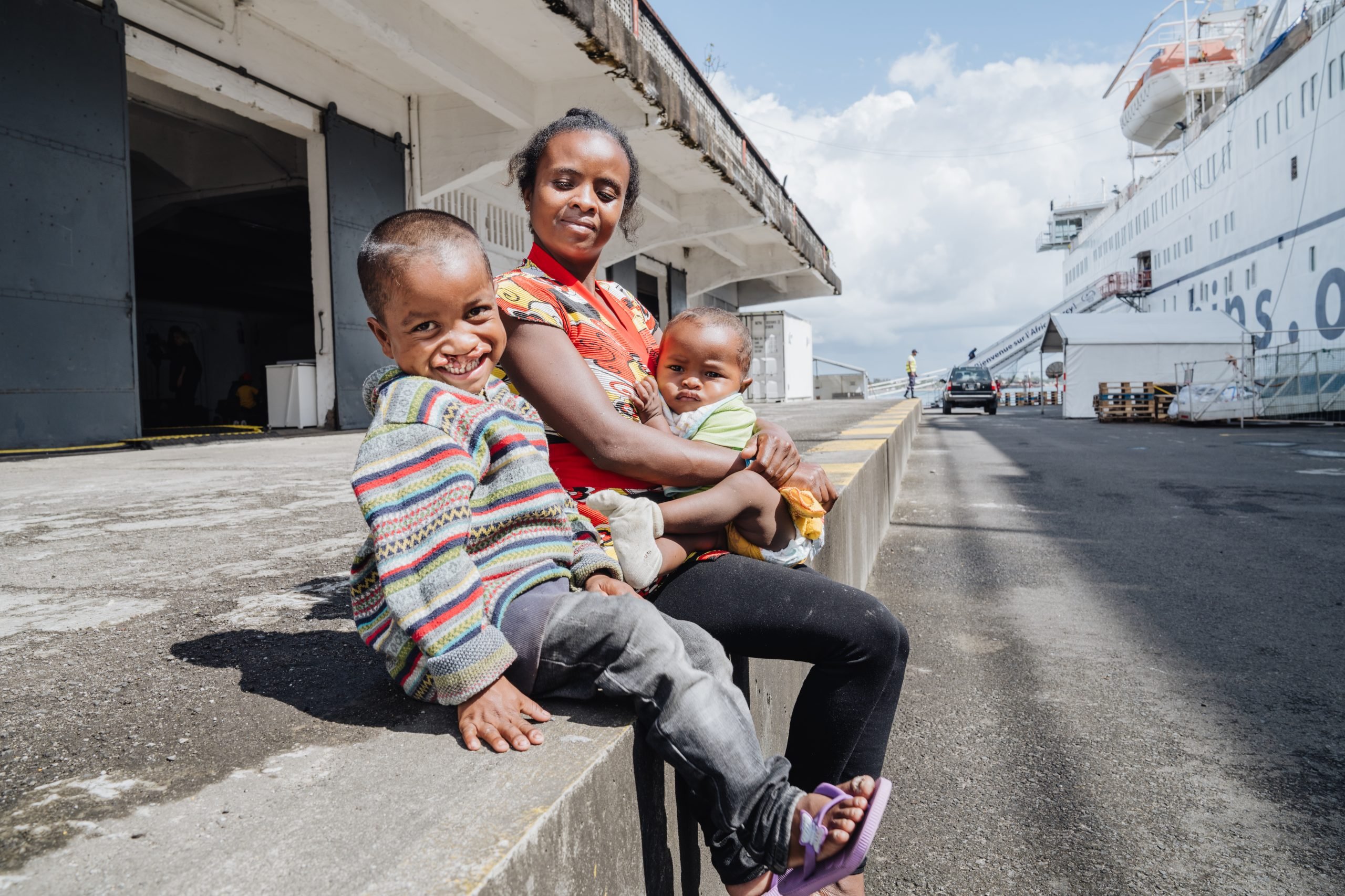 Harilala, cleft lip patient, with his mother and little brother ...